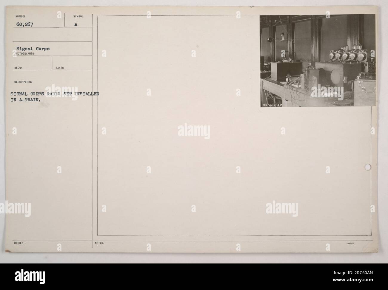 Signal Corps radio set being installed in train NUMBER 68,267. This ...