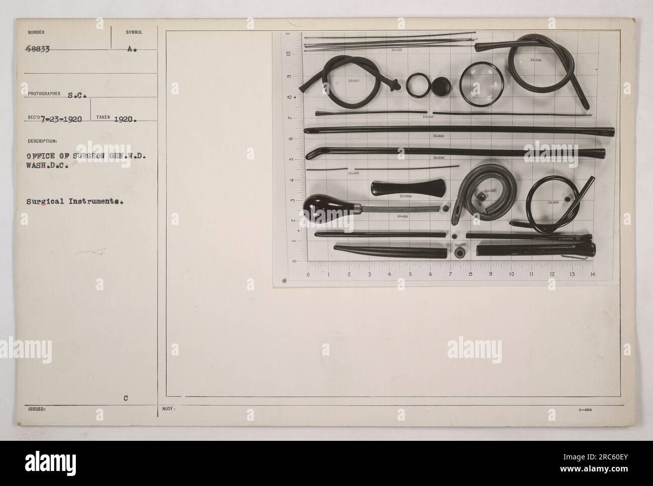 This photograph depicts a collection of surgical instruments, which ...