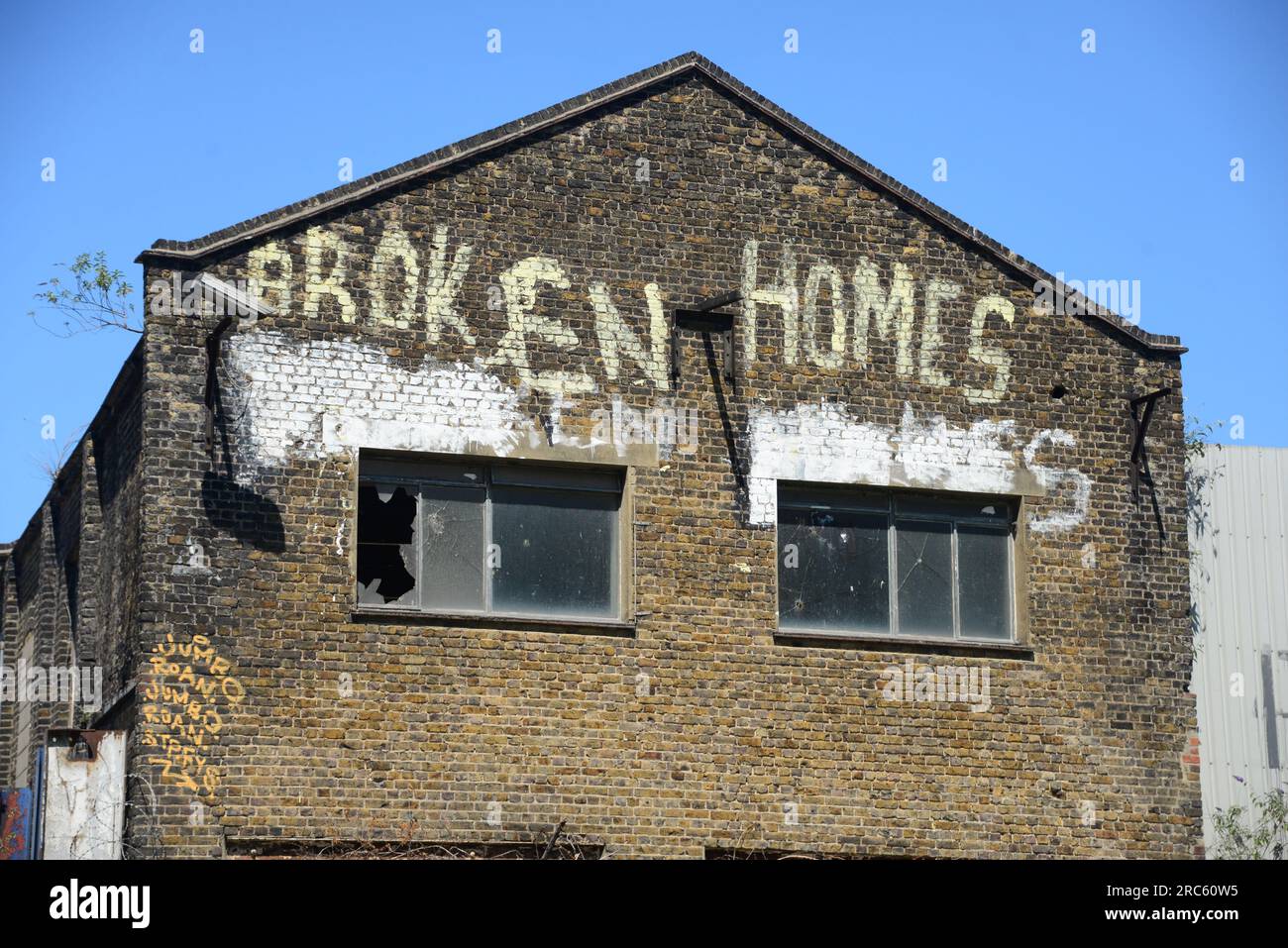 Broken Homes sign on a derelict building in Hackney Wick, London Stock ...