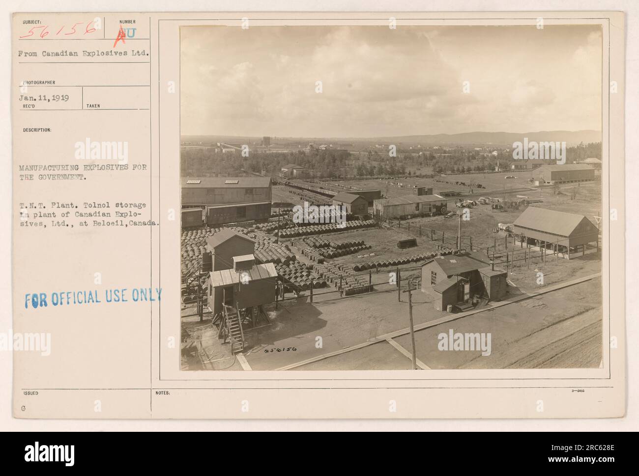 Workers at the T.N.T. Plant in Beloeil, Canada manufacturing explosives ...
