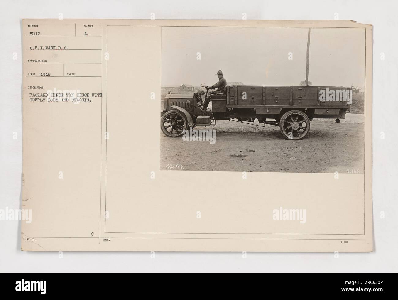 A Packard three-ton truck with a supply body and chassis. This photo ...