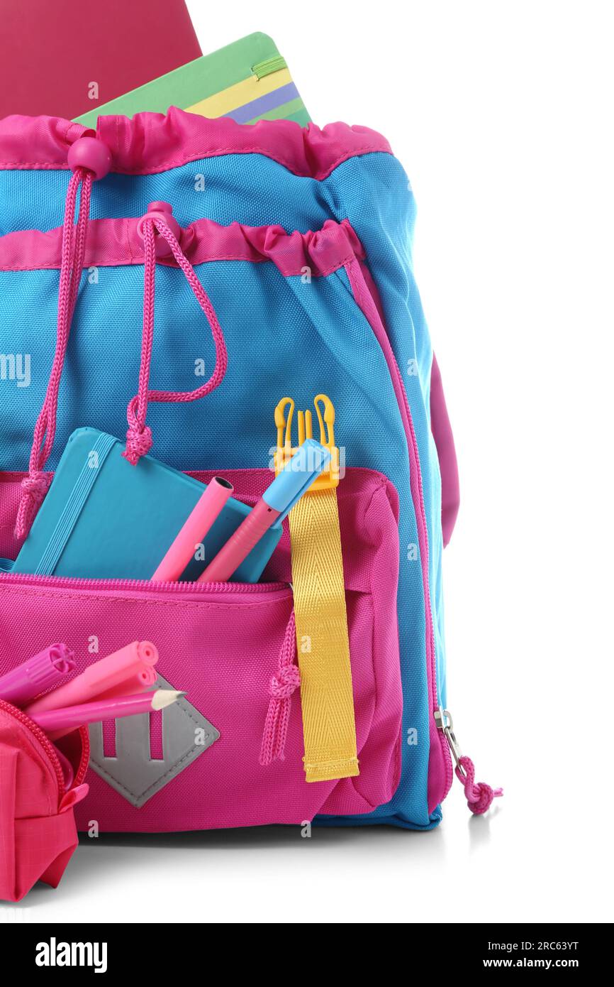 Color school backpack with notebooks, pencil case and stationery on ...