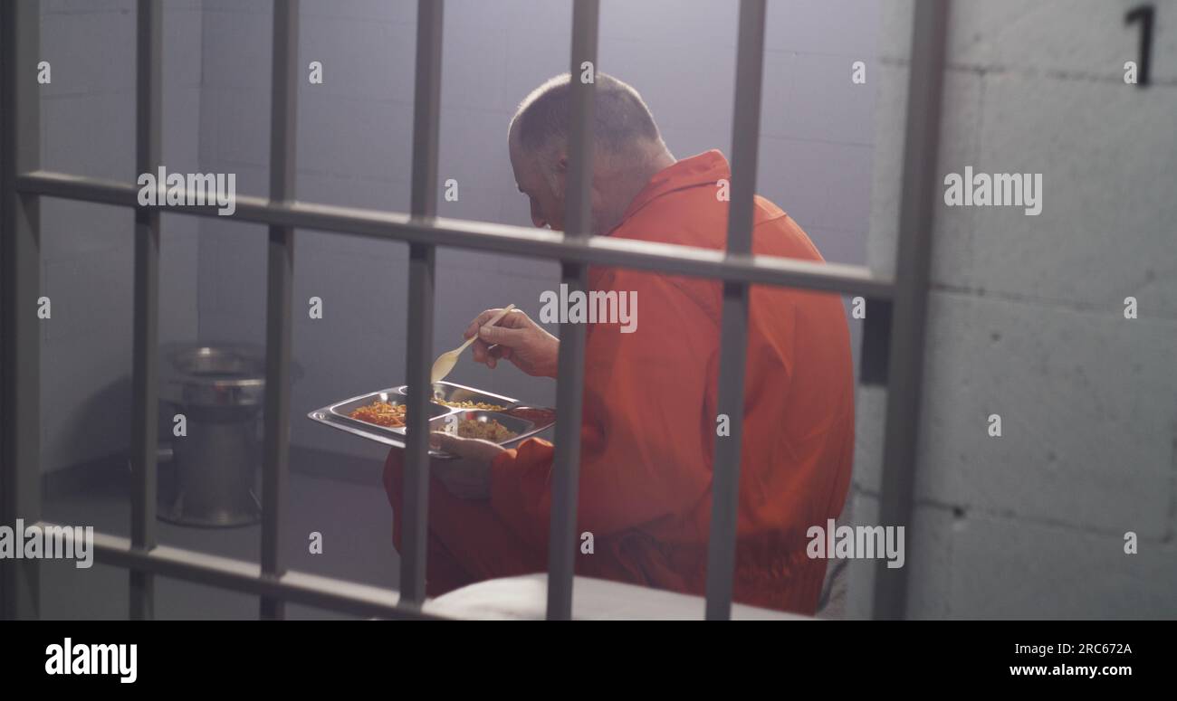 Prisoner jail bars hi-res stock photography and images - Alamy