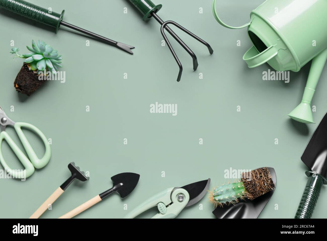 Frame made of different gardening tools on green background Stock Photo ...