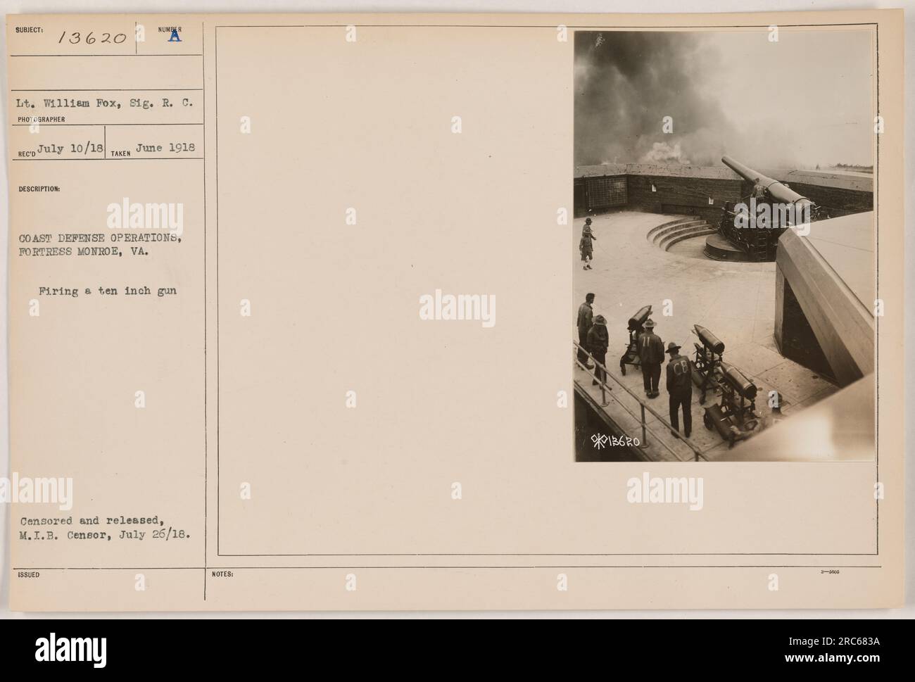 Soldiers at Fort Monroe, Virginia firing a ten-inch gun as part of ...