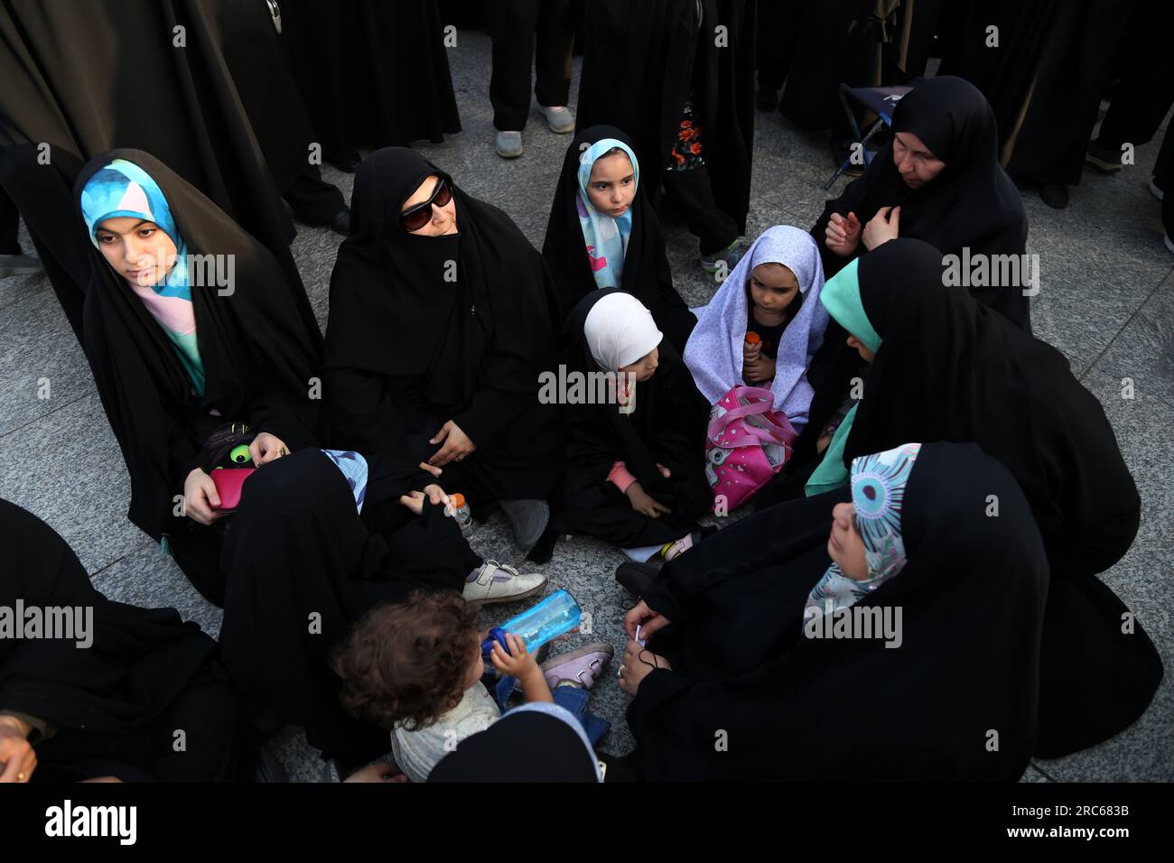 Tehran, Iran. 12th July, 2023. A group of Iranian veiled women gathers ...