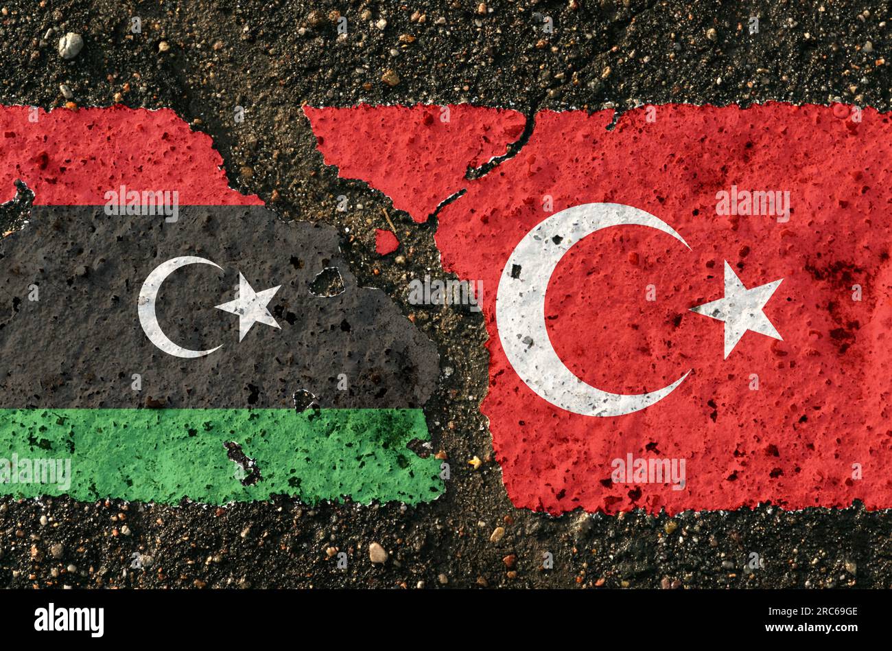 On the pavement are images of the flags of Libya and Turkey, as a ...