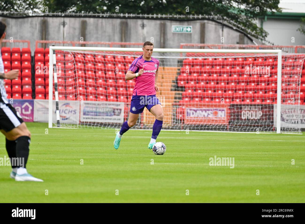 Sunderland AFC defender Dan Ballard brings the ball forward against ...