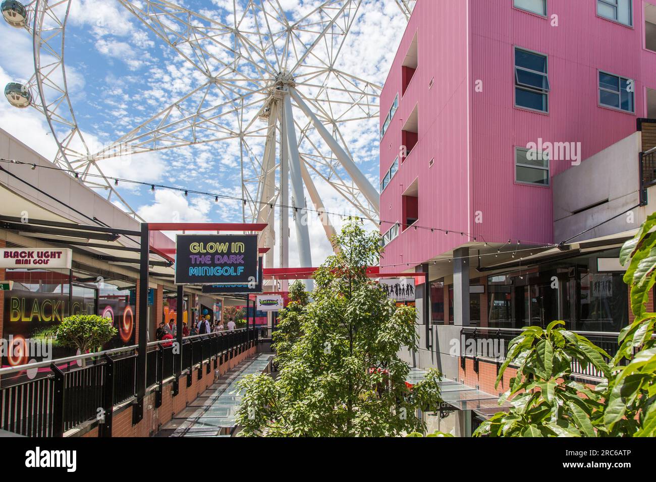 Melbourne Star Observation Wheel and Harbour Town Shopping Center Stock ...