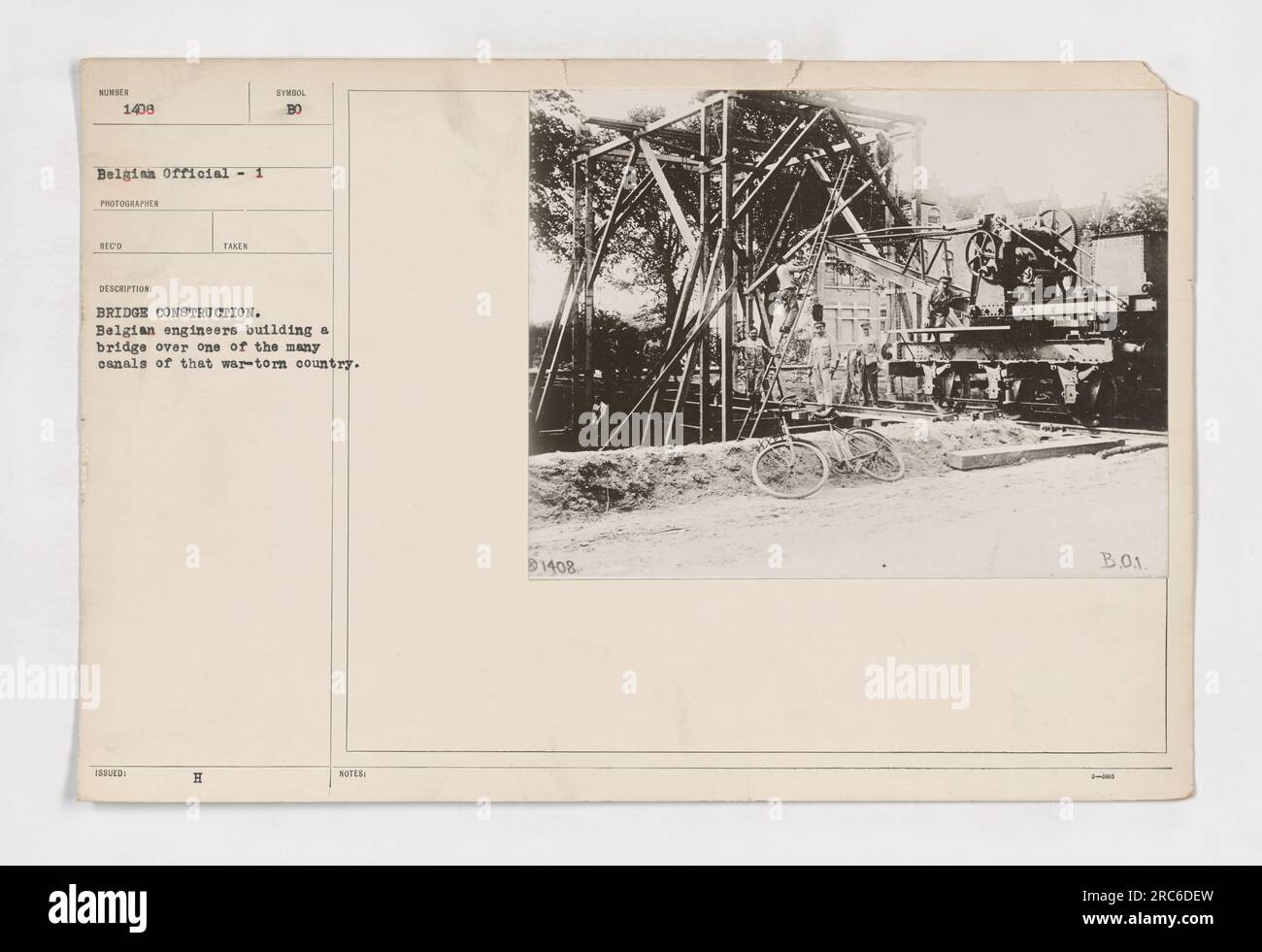 Belgian engineers constructing a bridge over a canal in war-torn ...