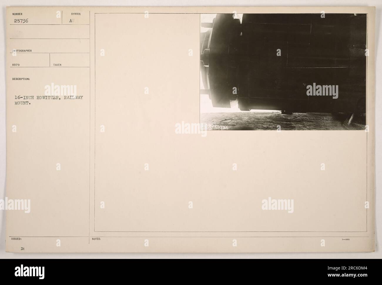 A Humber 25736 16-inch howitzer, mounted on a railway car, is in action ...