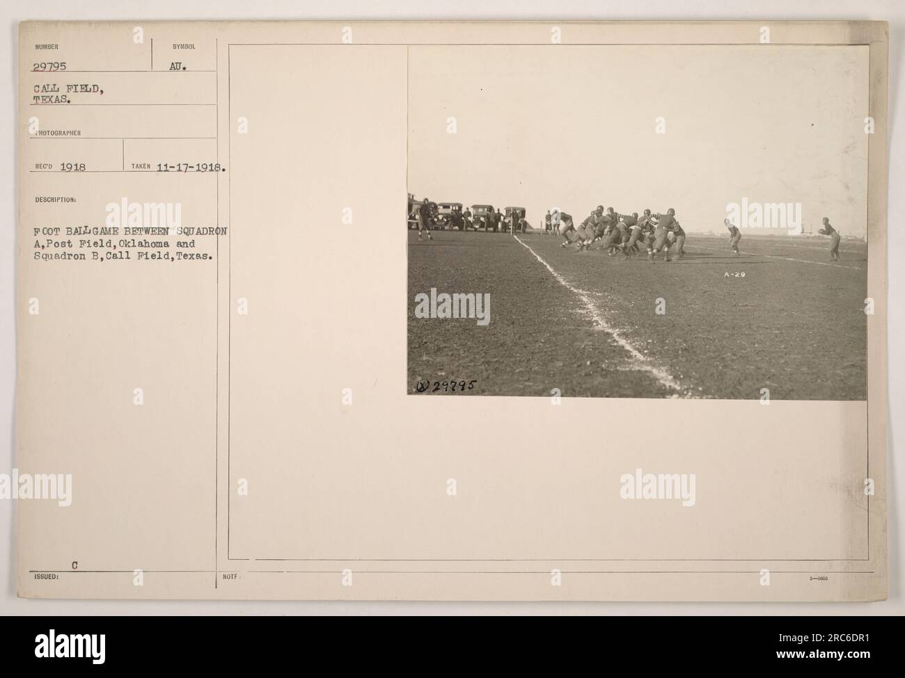 Photograph captures a football game between Squadron A from Post Field ...
