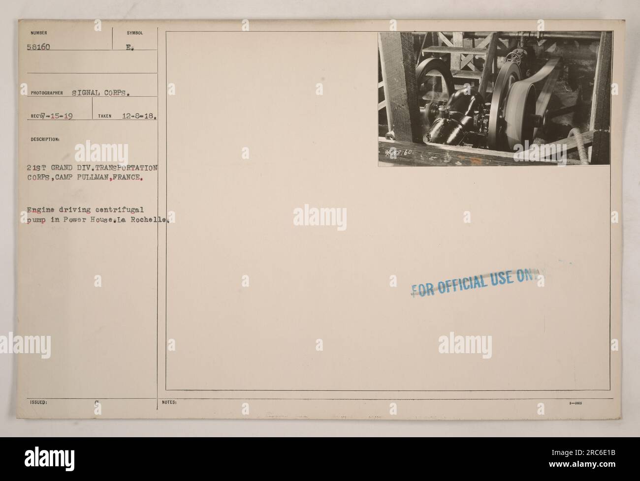 Engine driving a centrifugal pump in the Power House at Camp Pullman ...