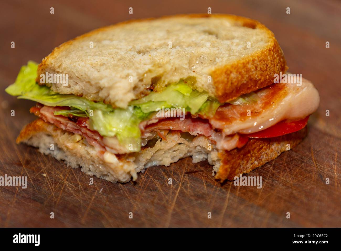 Traditional rustic sandwich with bacon and salad Stock Photo - Alamy
