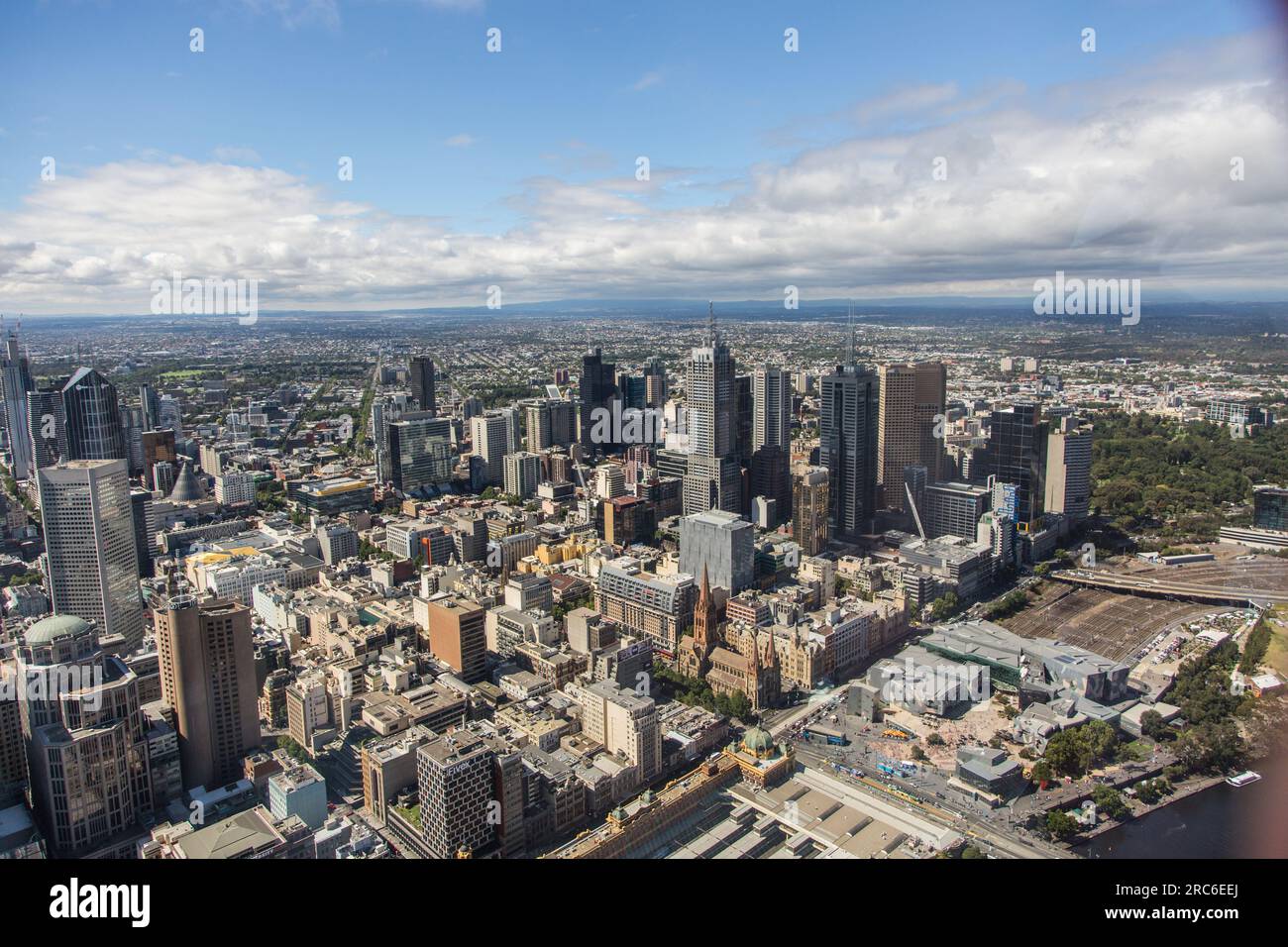 Flinders street with eureka tower and flinders street station hi-res ...