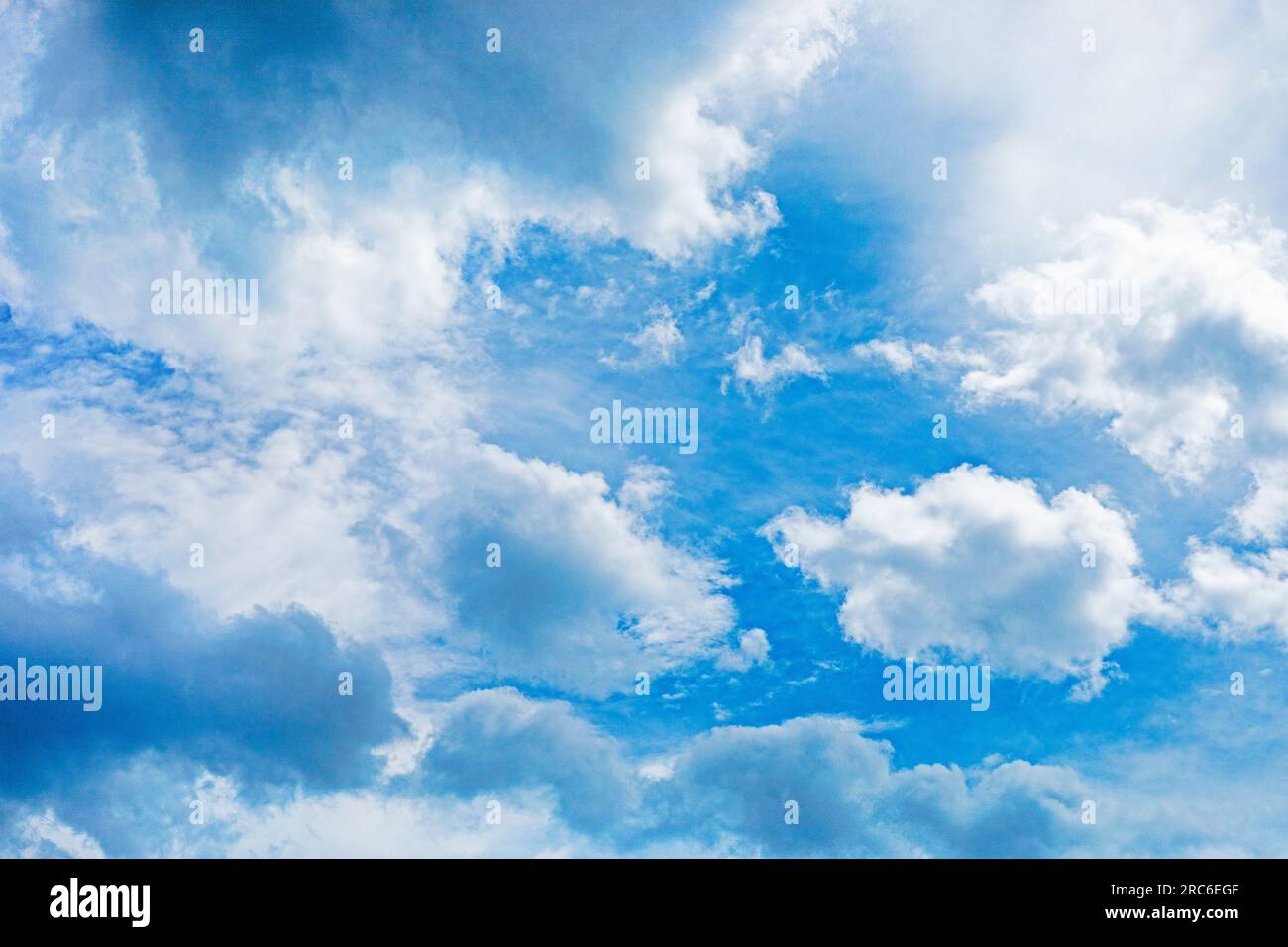blue sky with overcast rain clouds. A weather change Stock Photo - Alamy