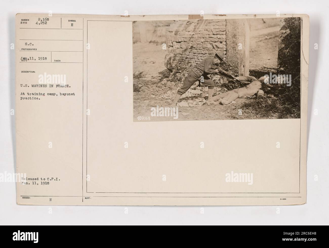 United States Marines participate in bayonet training practice at a ...