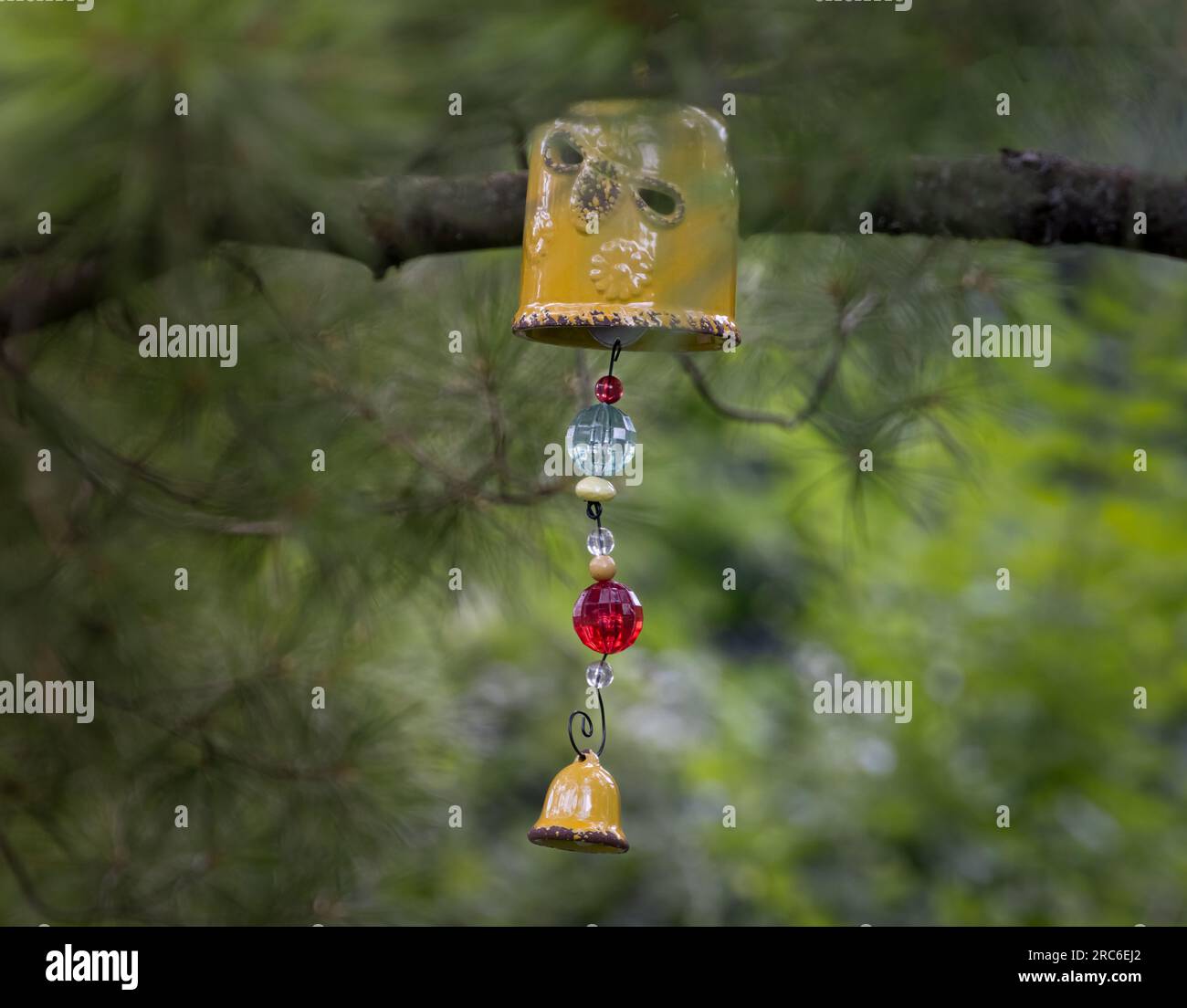 Bell hanging from tree hi-res stock photography and images - Alamy