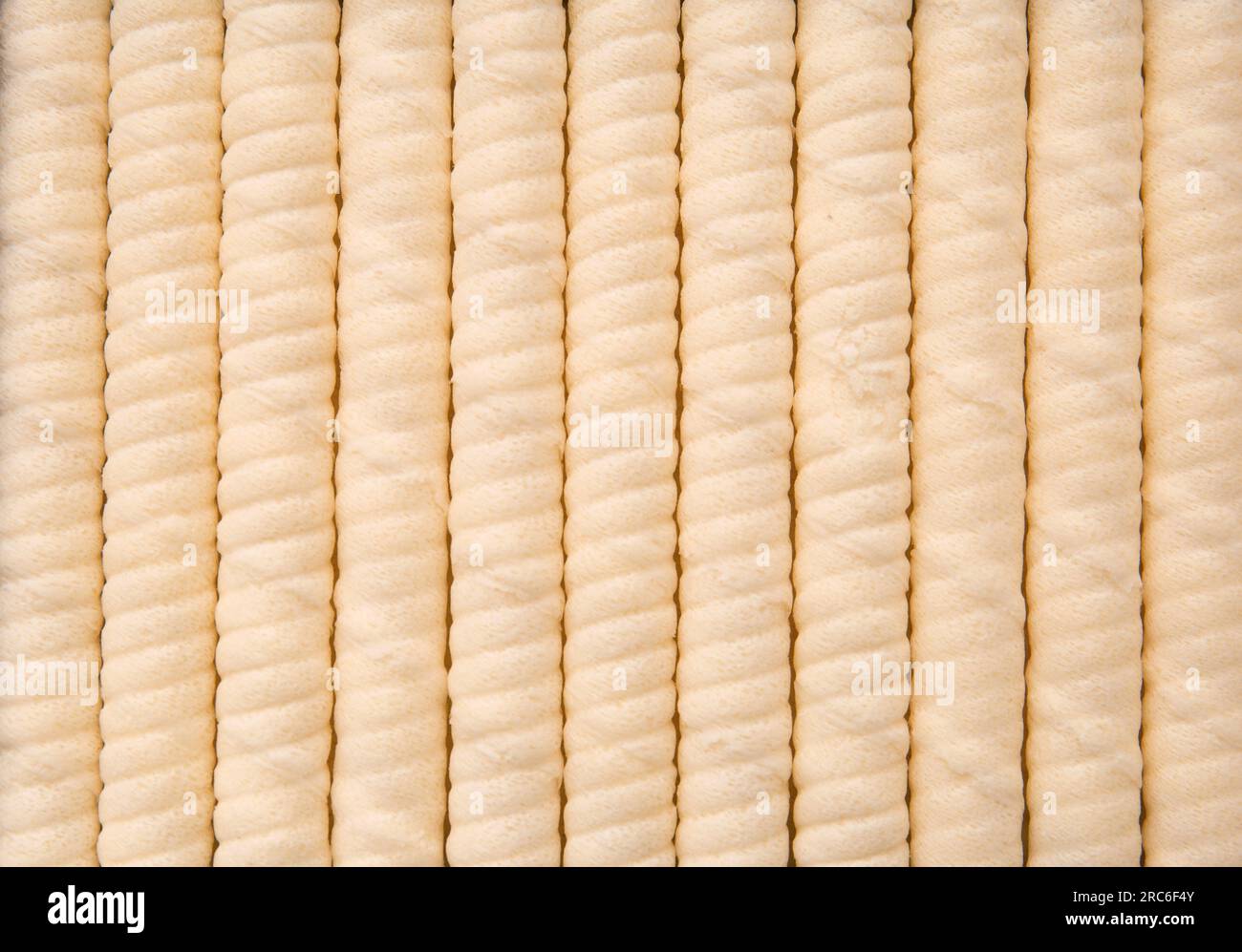 Crispy wafer rolls close-up as a background with space for text ...