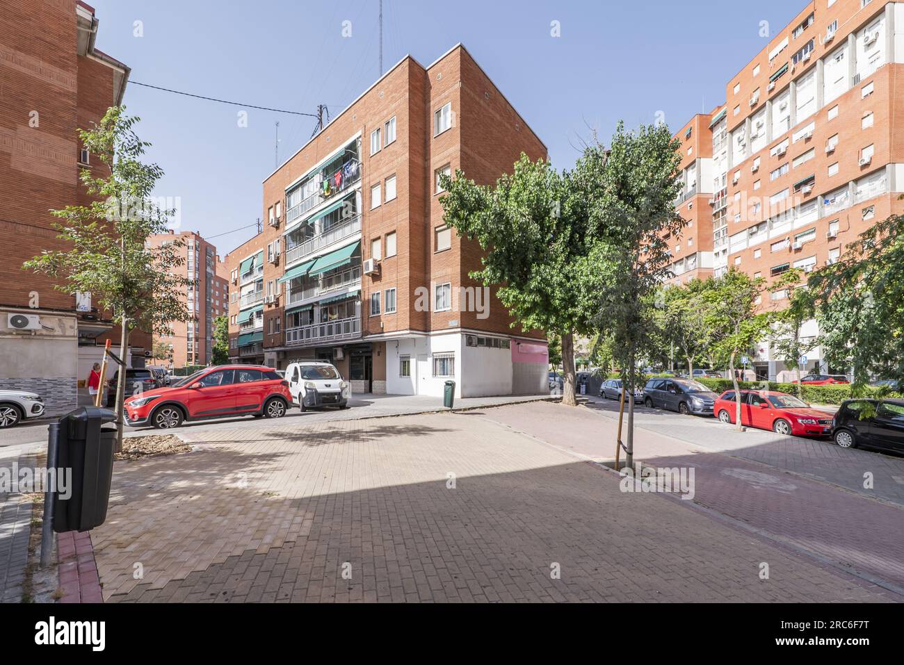 Building facades on a city block with a street junction Stock Photo - Alamy
