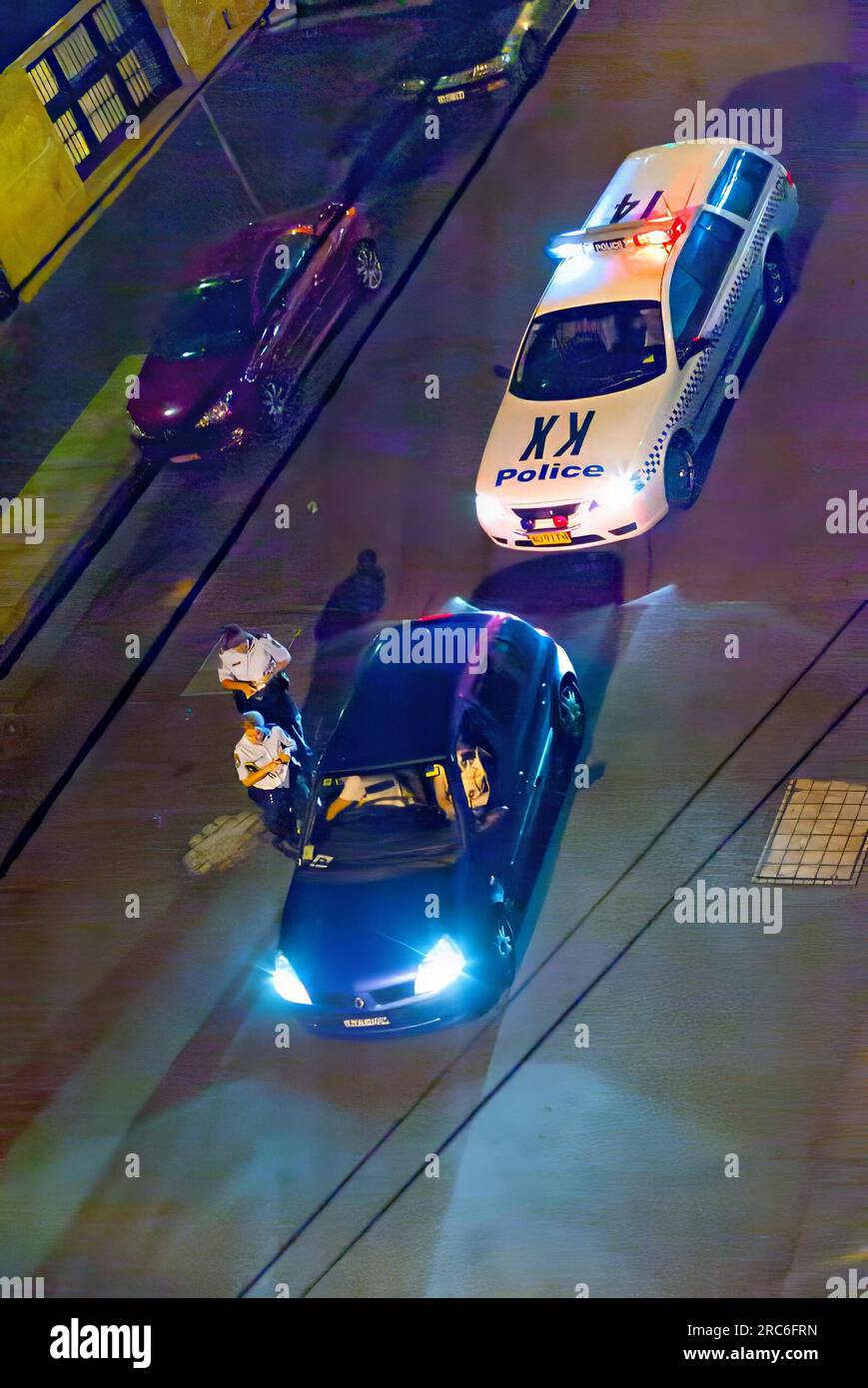 NSW Police conduct a night-time traffic stop on Liverpool Street near ...