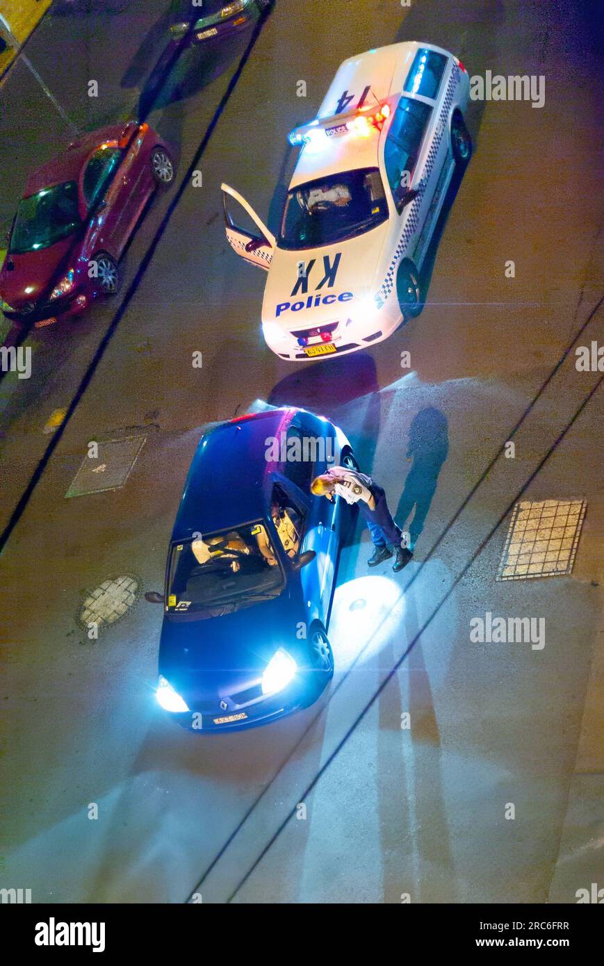 NSW Police conduct a night-time traffic stop on Liverpool Street near ...