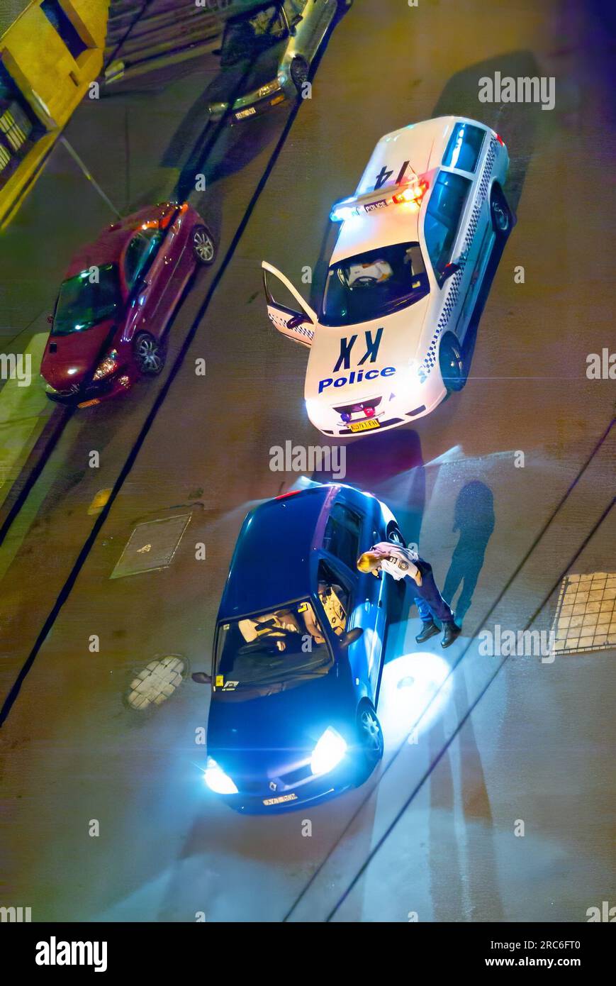 NSW Police conduct a night-time traffic stop on Liverpool Street near ...