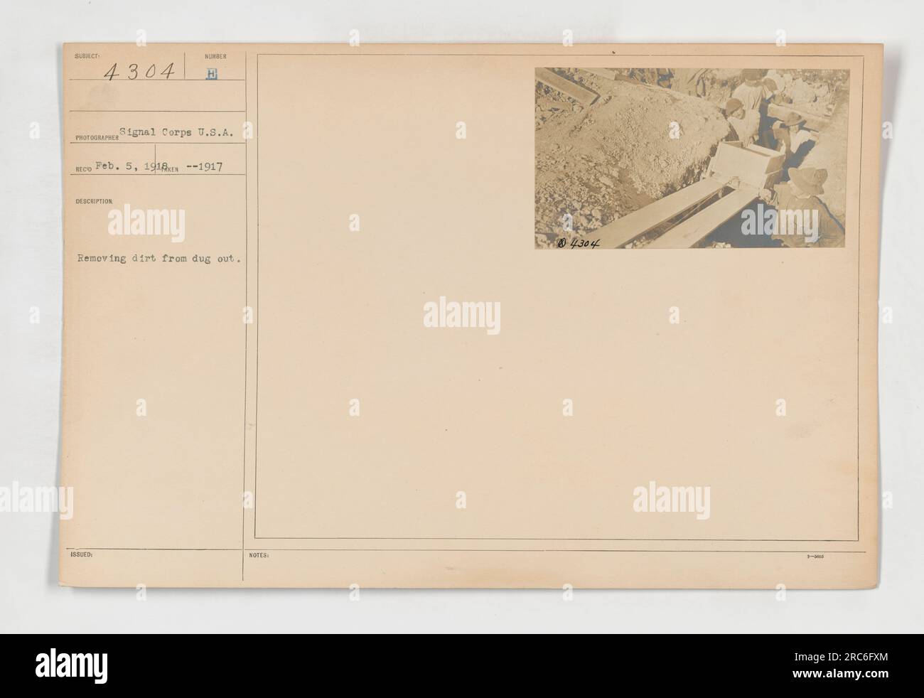 Soldiers clearing dirt from a dugout during World War I Stock Photo - Alamy