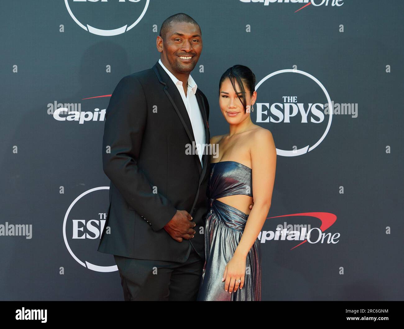 Former professional NBA basketball player Metta World Peace, left, and ...