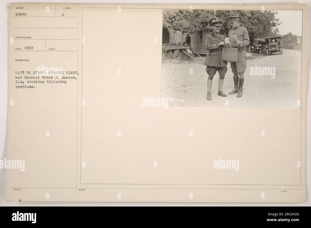 Colonel Henny and Colonel Frank J. Morrow are studying billeting ...