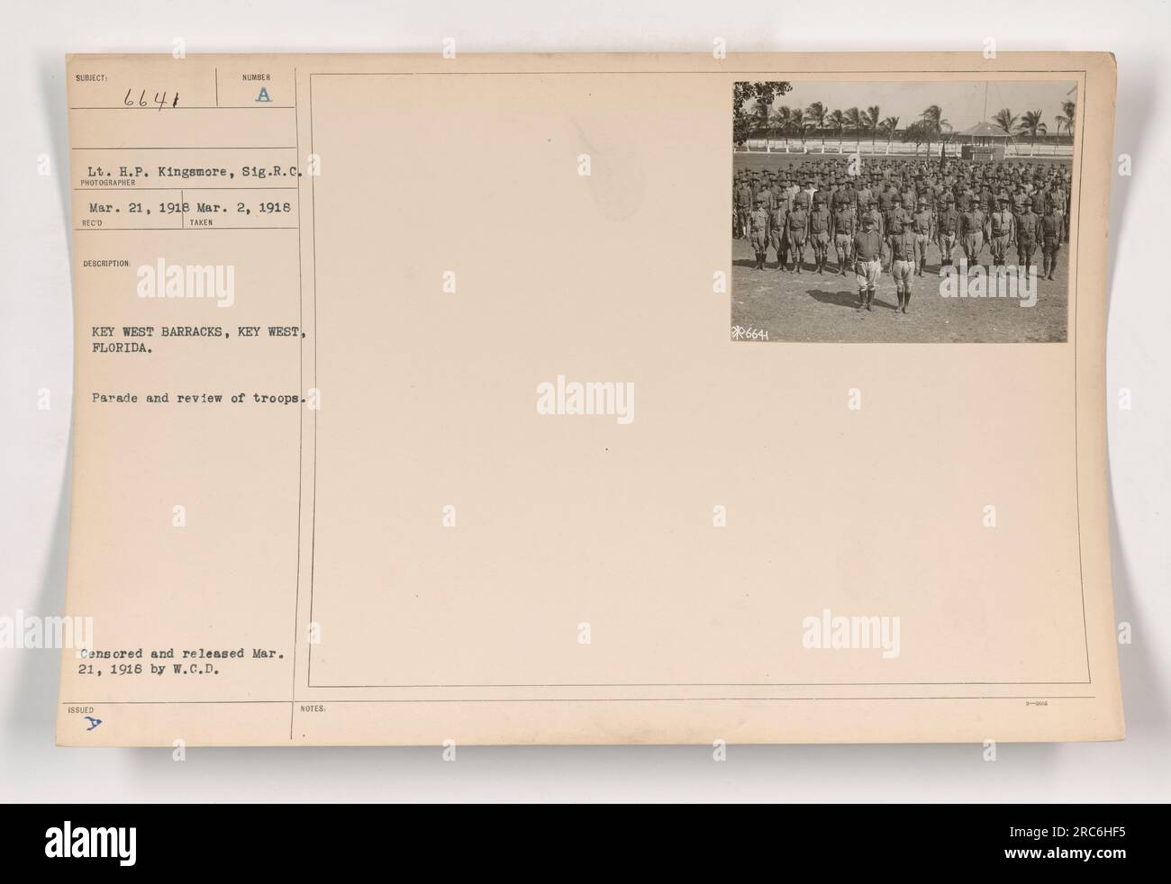 Soldiers marching in a parade and being reviewed at Key West Barracks ...
