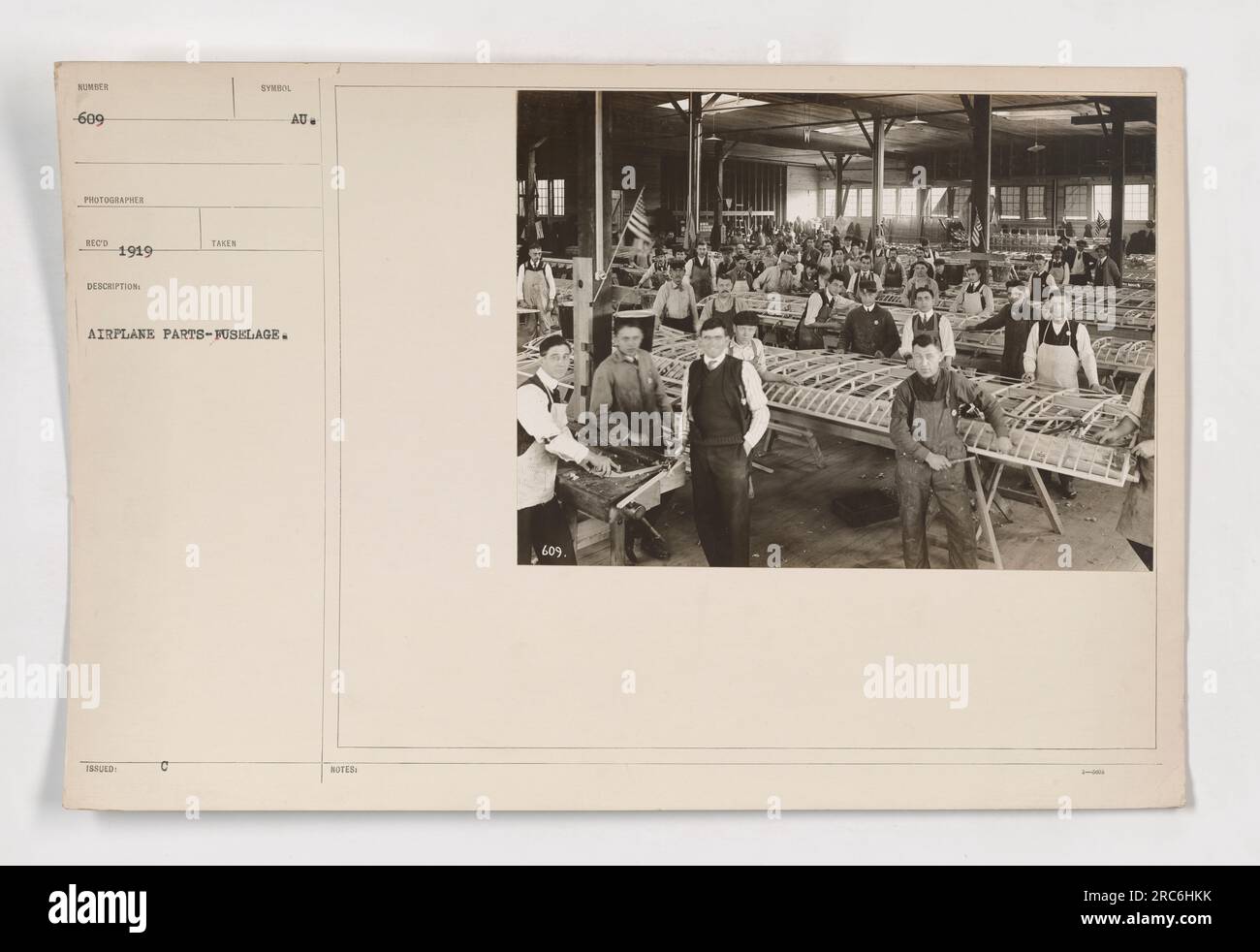 A photograph taken in 1919 of an airplane production facility. The ...