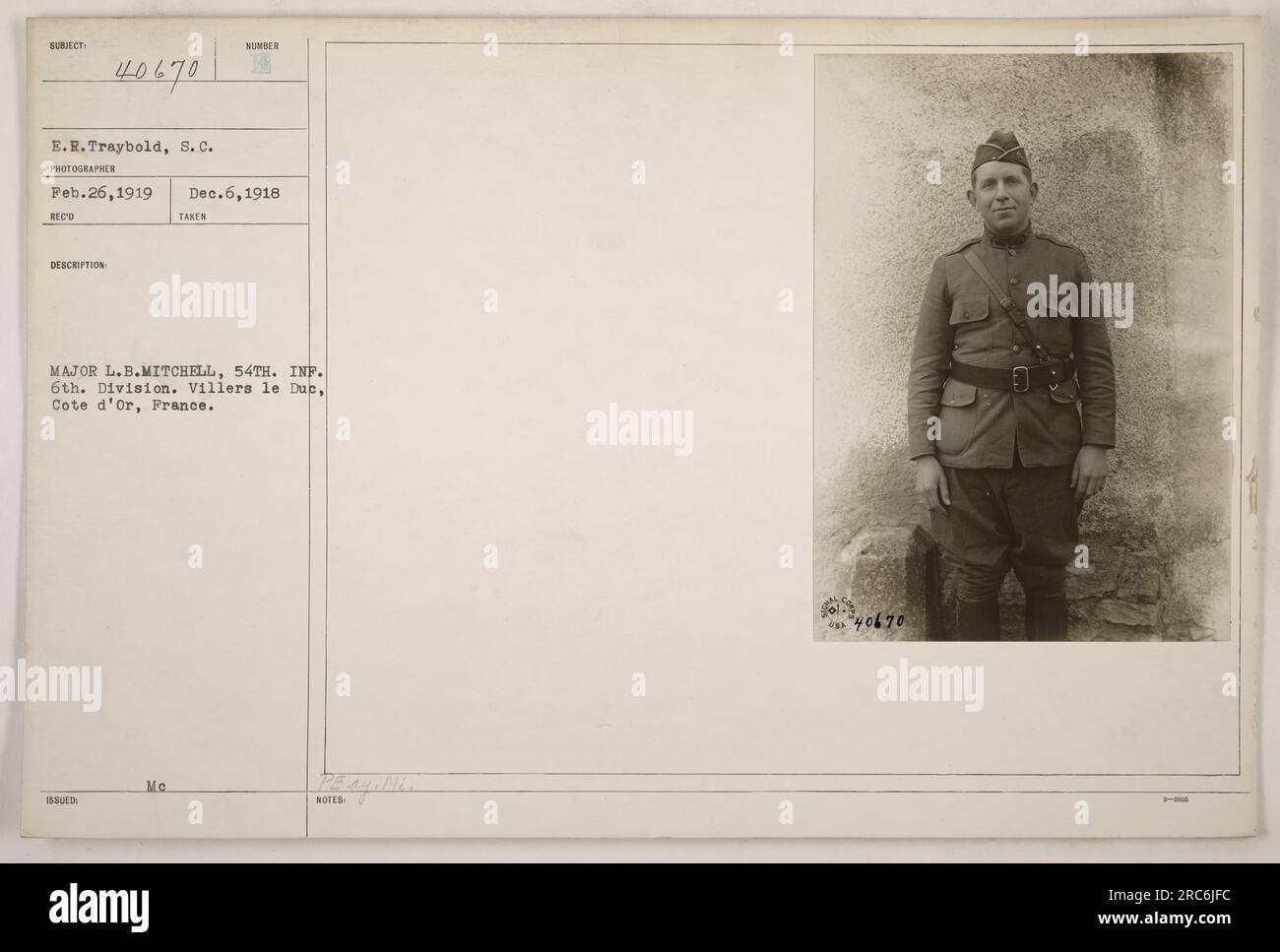 Major L.B. Mitchell of the 54th Infantry, 6th Division, is being ...