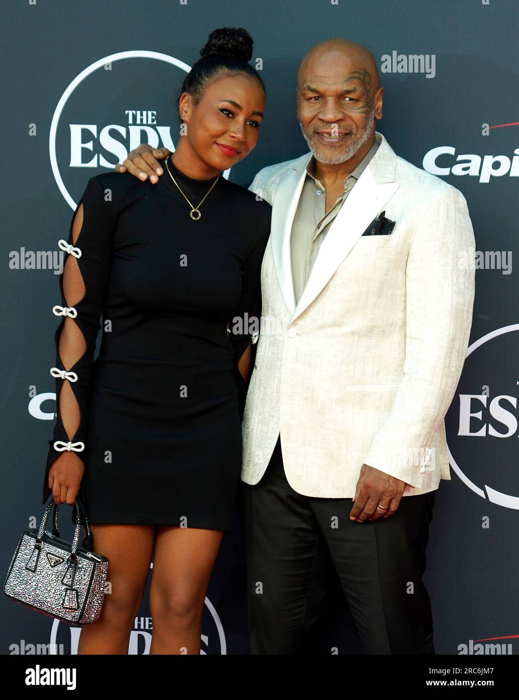 Lakiha Spicer, left, and former professional Mike Tyson arrive at the ...