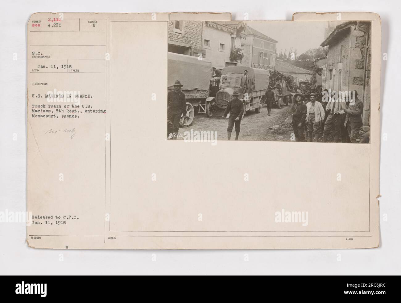 A truck train of United States Marines from the Fifth Regiment is seen ...