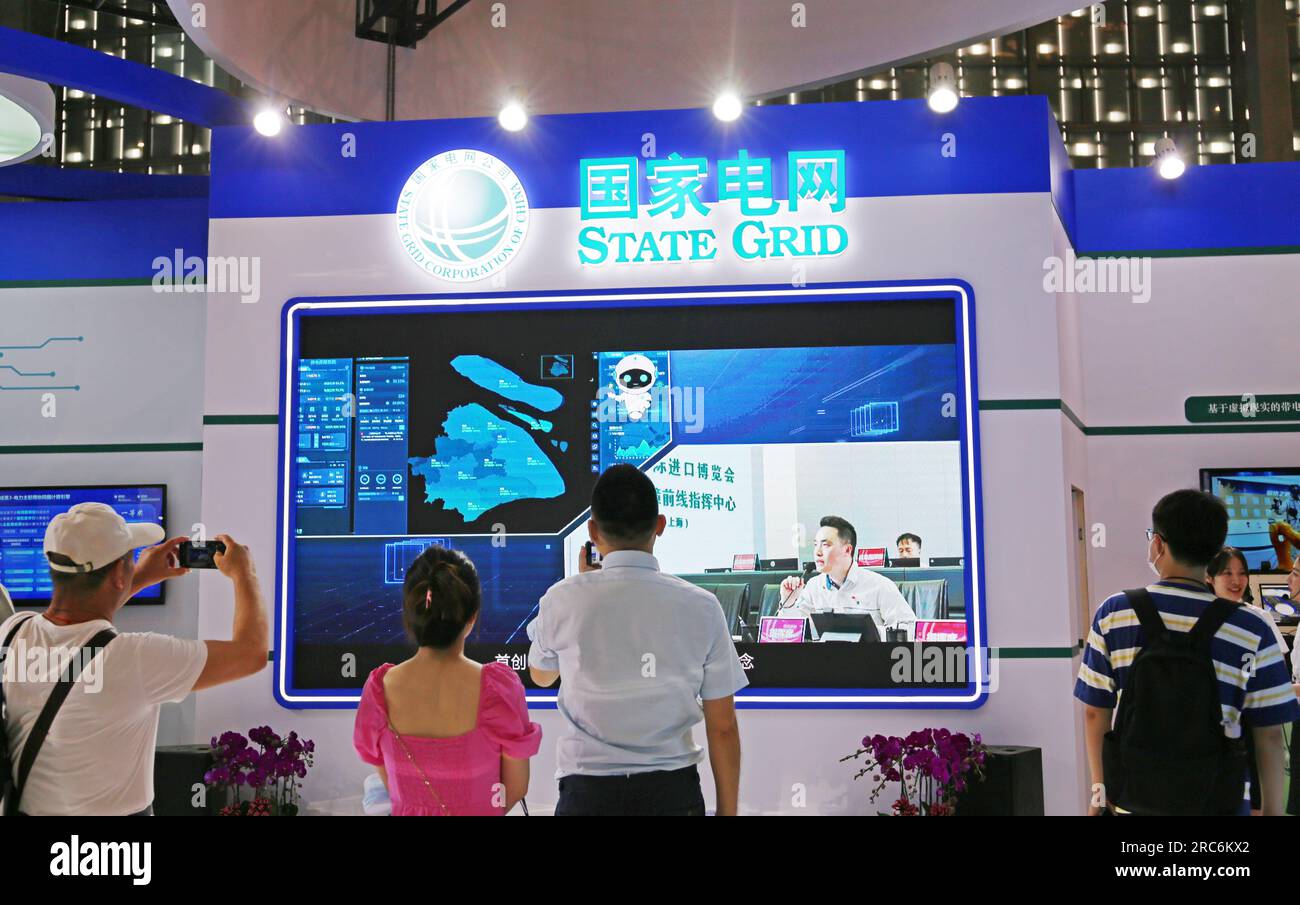 SHANGHAI, CHINA - JULY 7, 2023 - Visitors visit the booth of State Grid ...