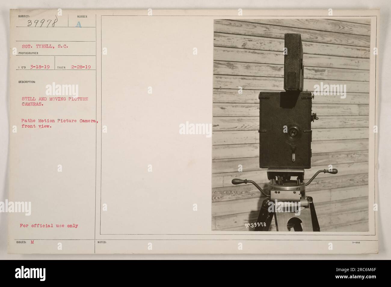 A Pathe Motion Picture Camera, front view. This image shows a still and ...