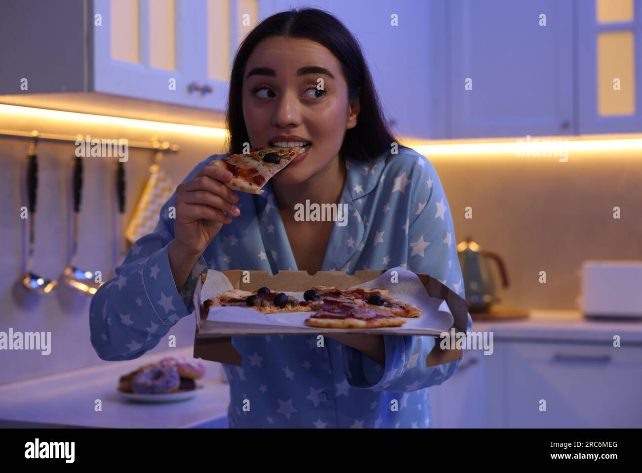 Alone woman pizza night hi-res stock photography and images - Alamy