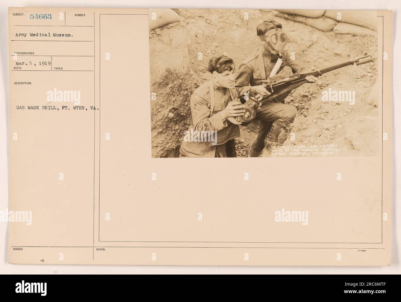 Soldiers participating in a gas mask drill at Ft. Myer, VA. The ...