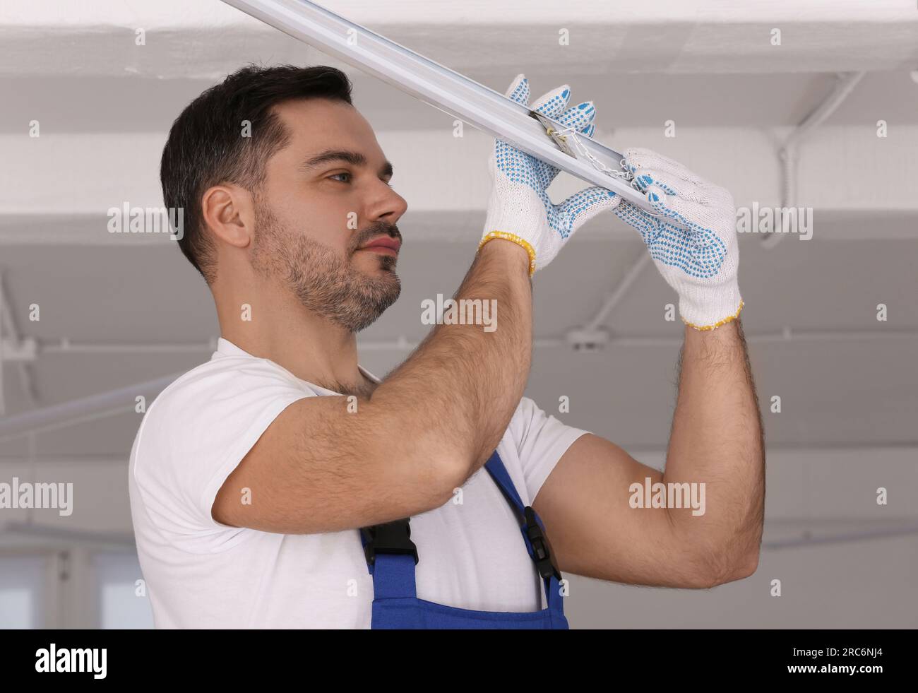 Installing light fixture hi-res stock photography and images - Alamy
