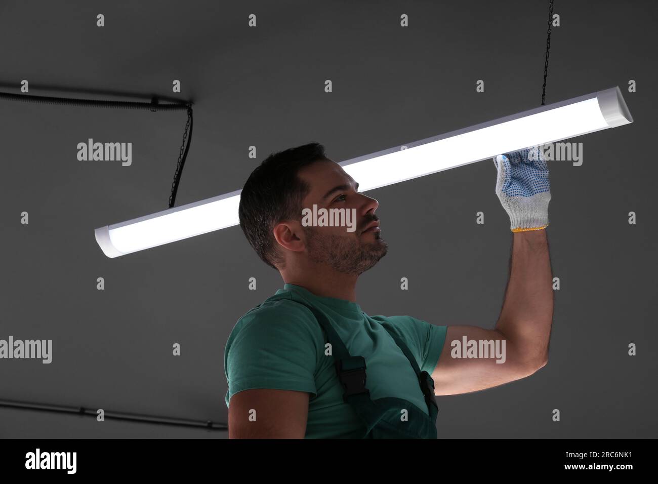 Installing light fixture hi-res stock photography and images - Alamy