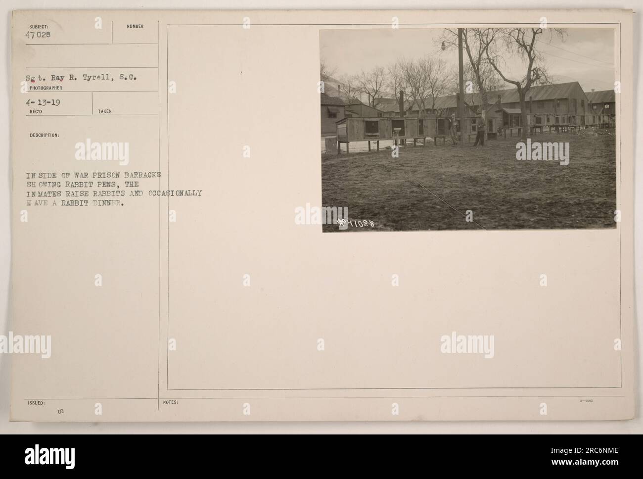 "Photograph depicting the inside of war prison barracks, featuring ...