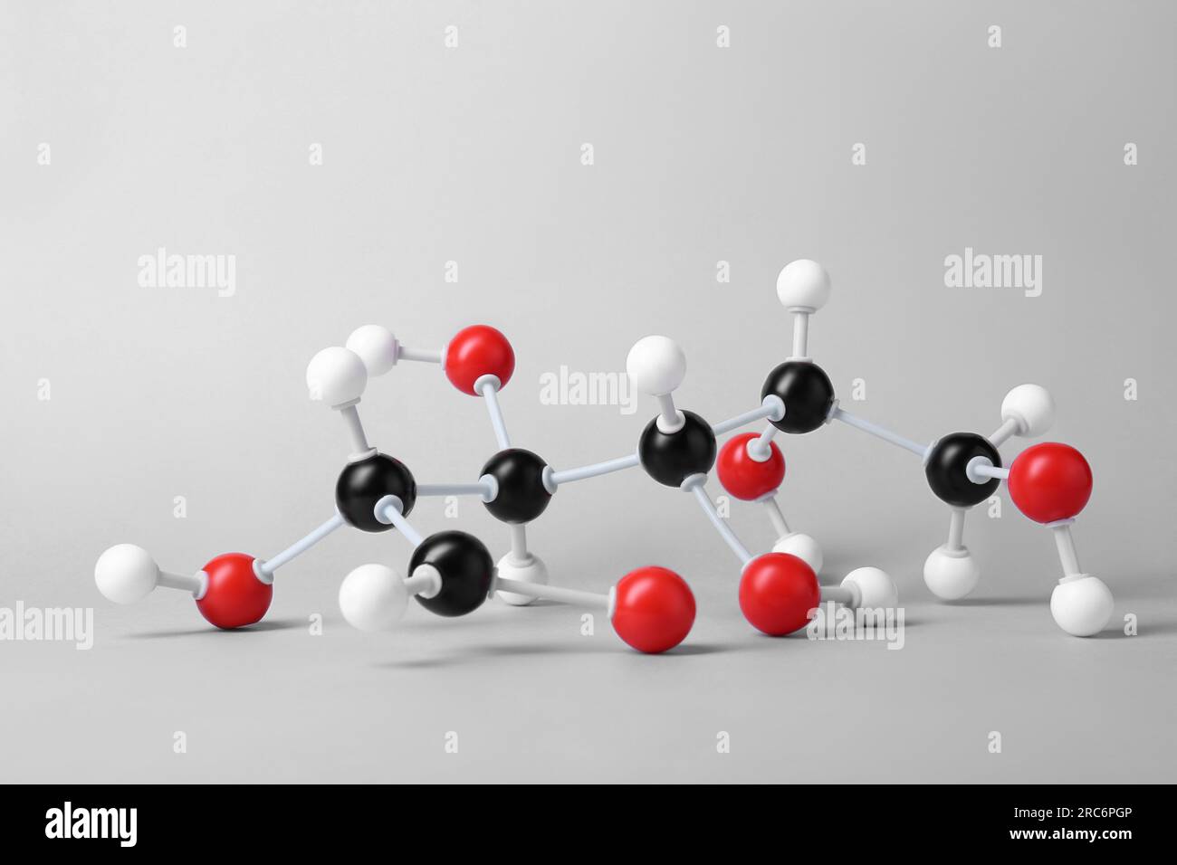 Molecule of glucose on light grey background. Chemical model Stock ...