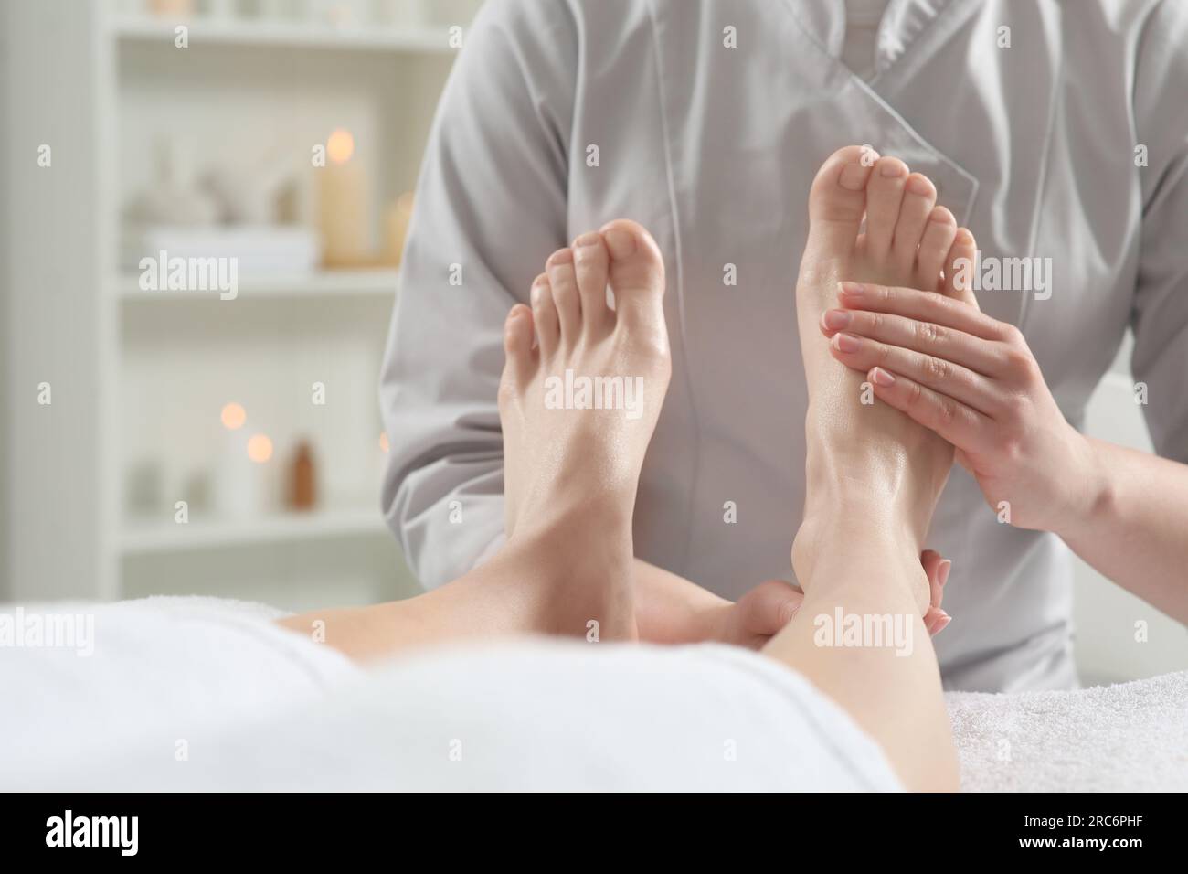 Woman receiving foot massage in spa salon, closeup Stock Photo - Alamy