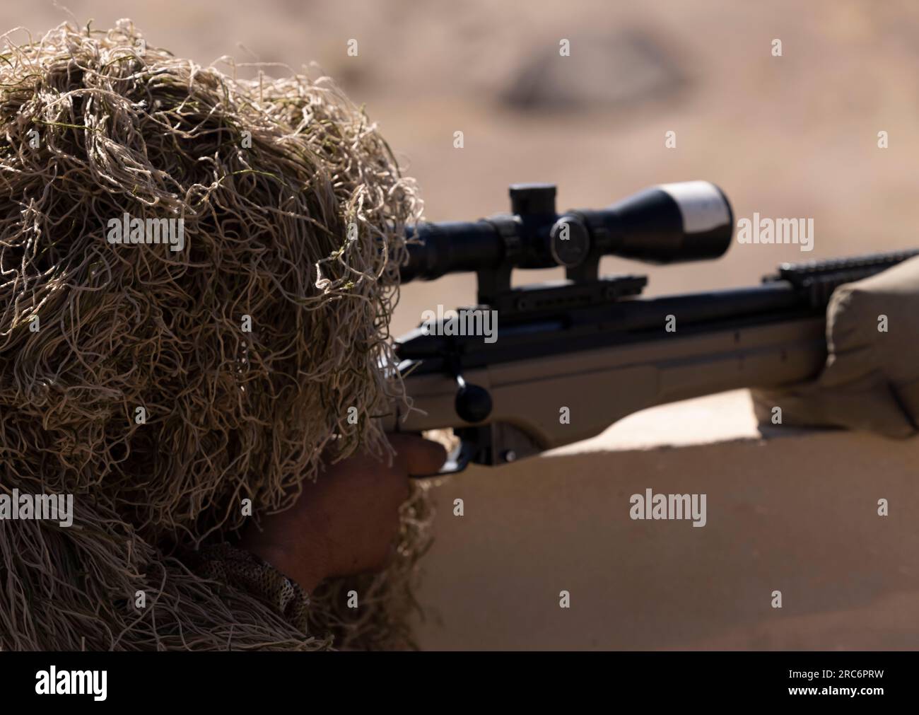 A member of the Jordanian Armed Forces conducts sniper training during ...