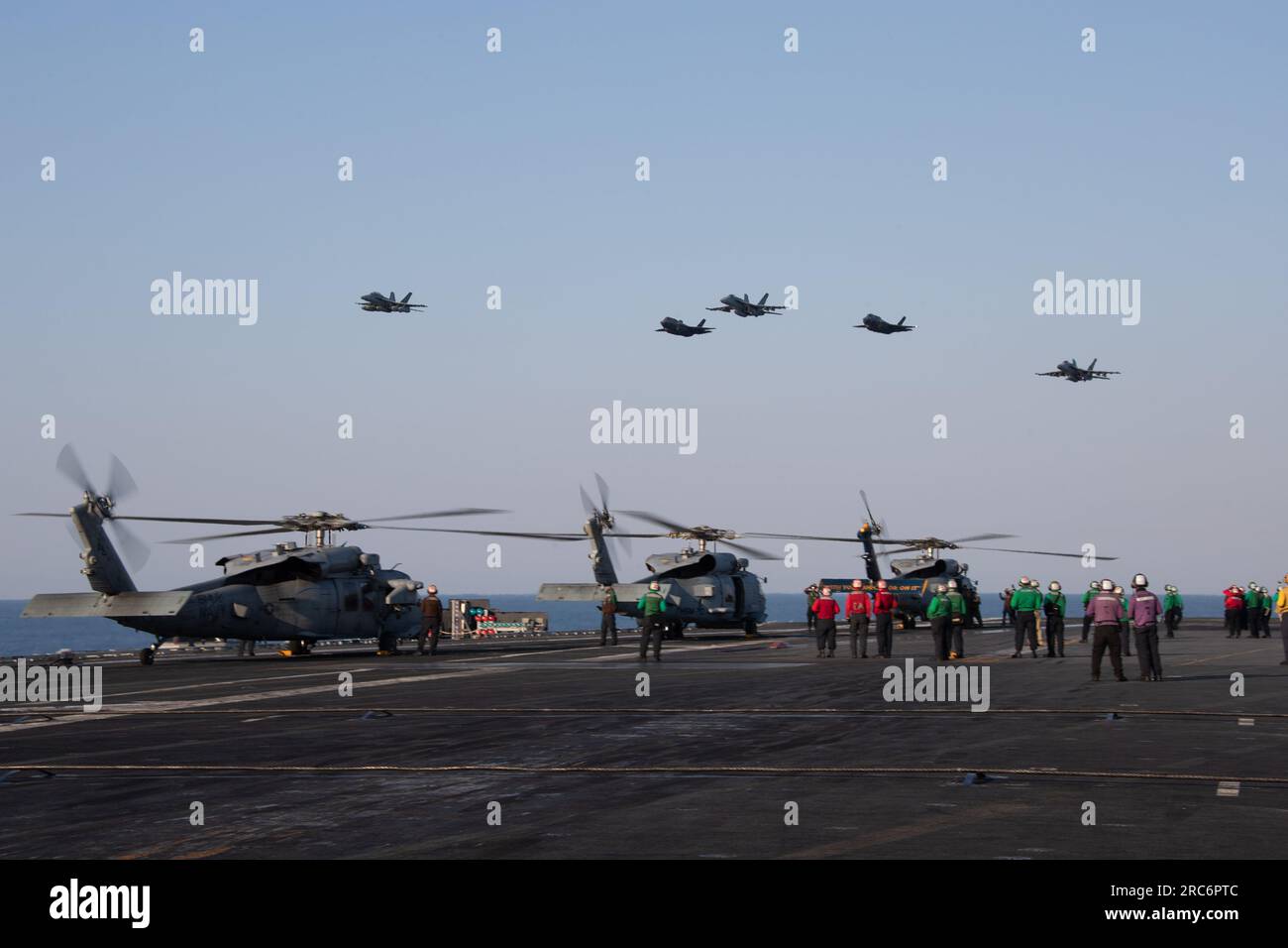 F/A-18s attached to Carrier Air Wing (CVW) 8 and Italian F-35s fly in ...