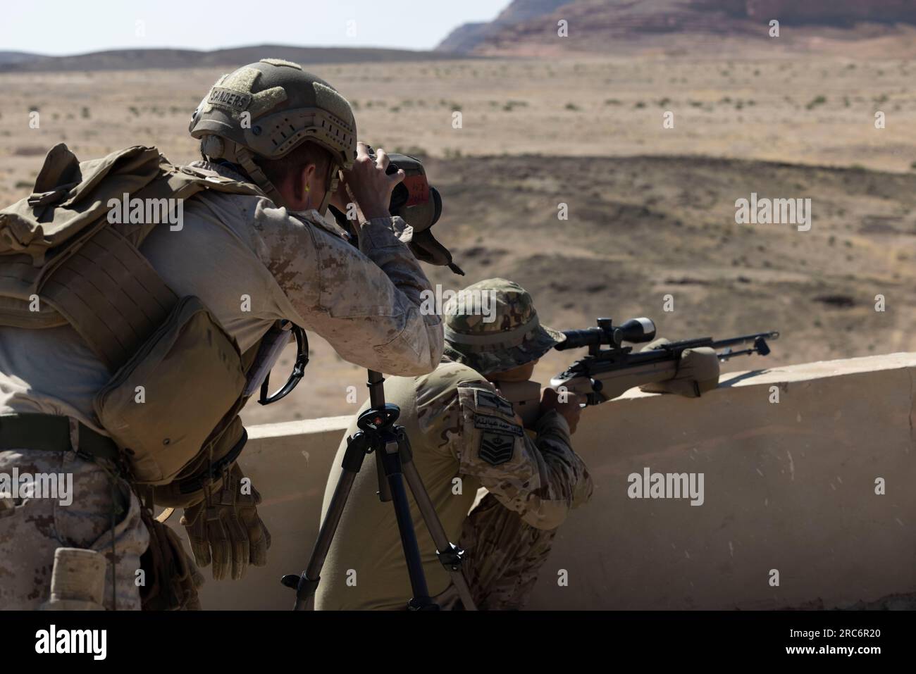 A U.S. Marine with Wraith 2 scout sniper team, 2nd Battalion, 5th Marines, 1st Marine Division ...
