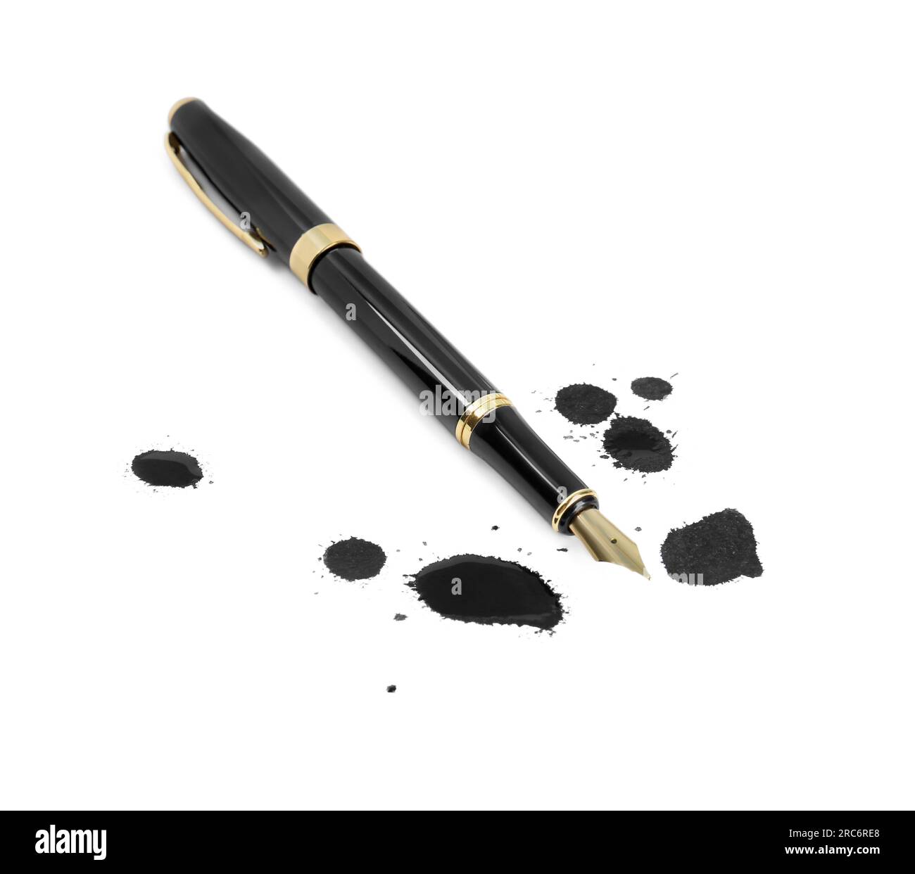 Stylish black fountain pen and blots of ink isolated on white Stock ...