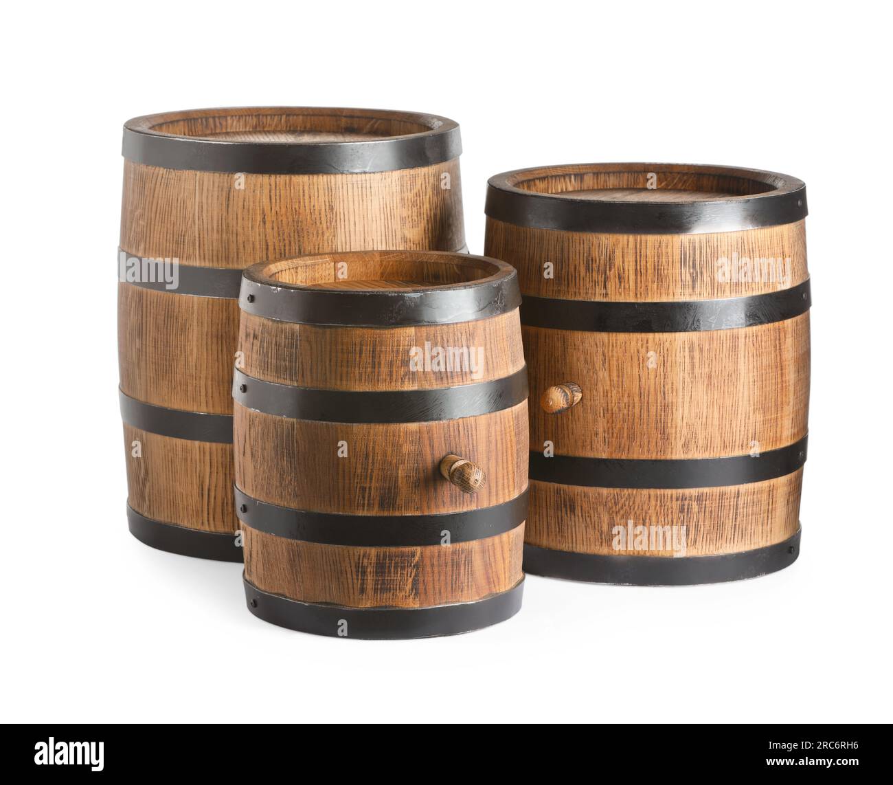 Three traditional wooden barrels on white background Stock Photo - Alamy