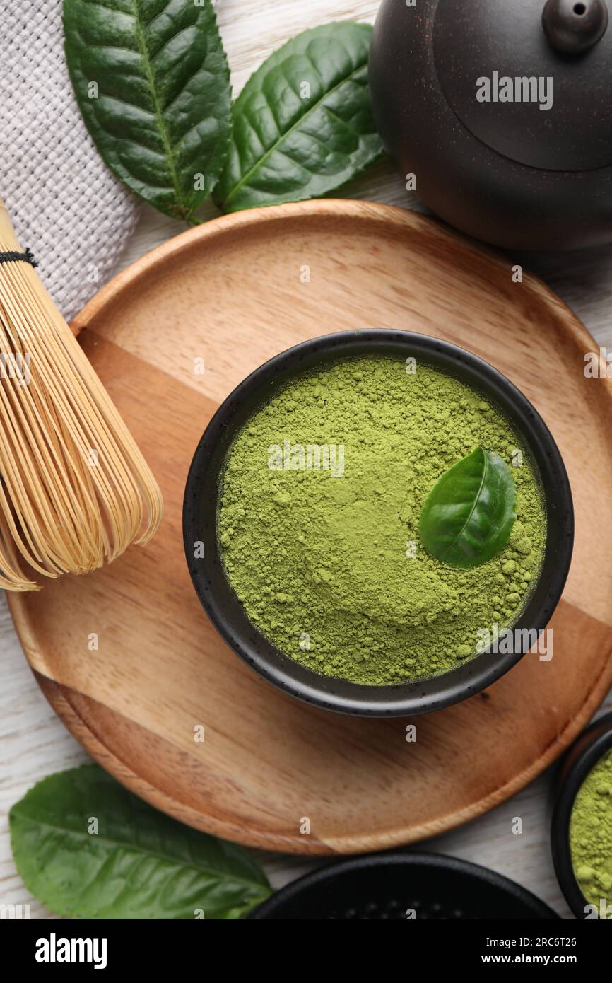 Flat lay composition with green matcha powder on table Stock Photo - Alamy